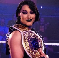 Chat with Rhea Ripley | character.ai | Personalized AI for every moment ...